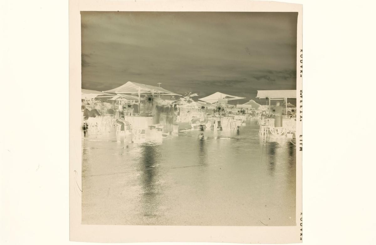 Negative photograph of a market by Lee Sow Lim